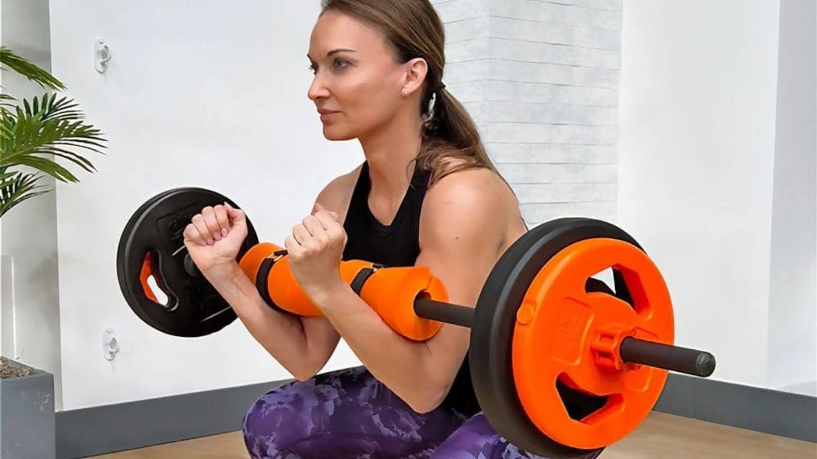 Zercher Squat vs Front Squat: Which Builds More Strength? - XcelerateGyms