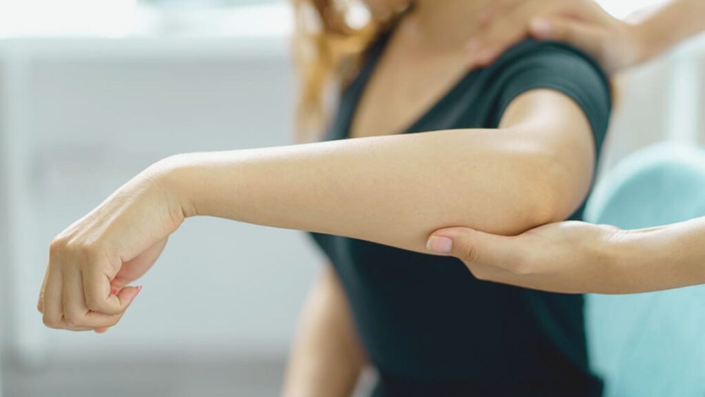 Forearm Pain When Curling: Causes & Prevention - XcelerateGyms