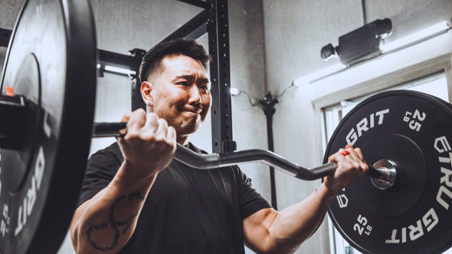 What Is an EZ Bar? Benefits, Uses & Real Results - XcelerateGyms