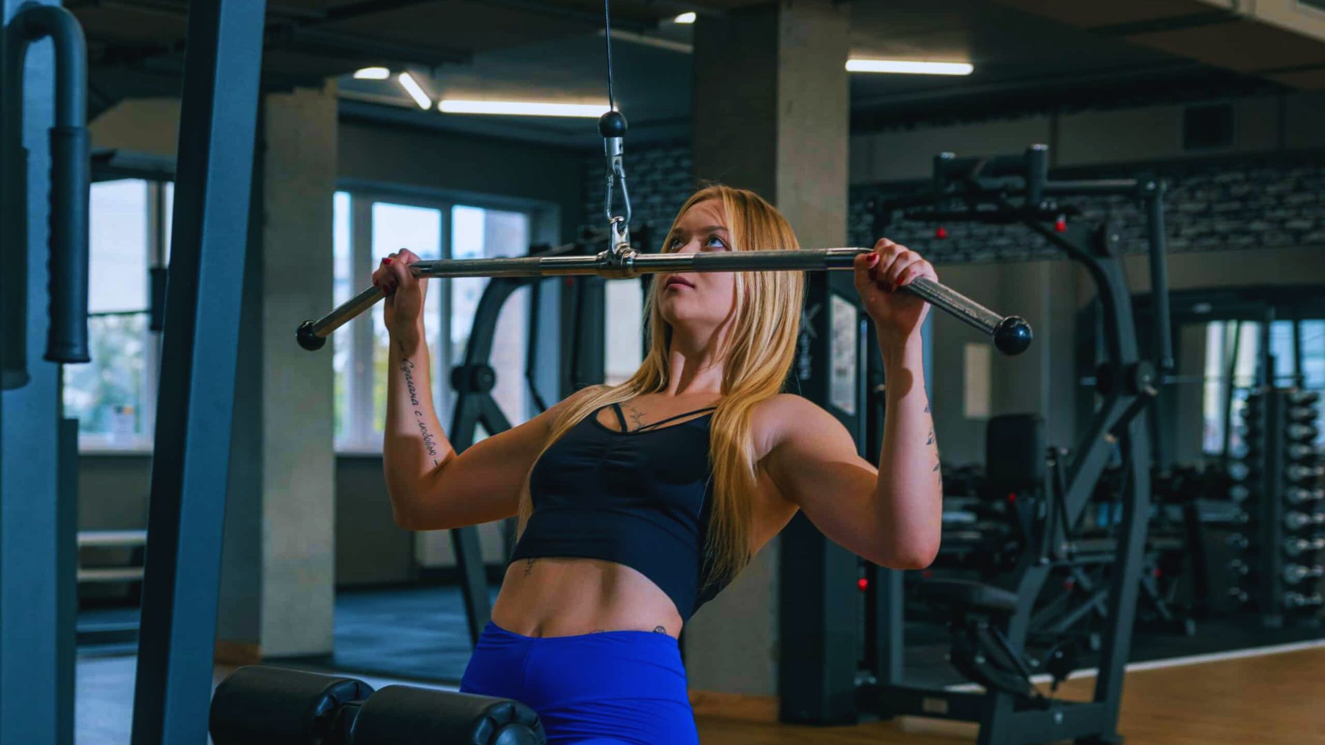 7 Vertical Pull Exercises for a Wider, Stronger Back - XcelerateGyms